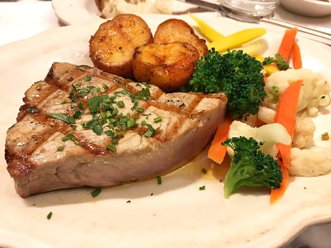 A perfectly seared tuna steak that would make Neptune himself put down his trident and pick up a fork.
