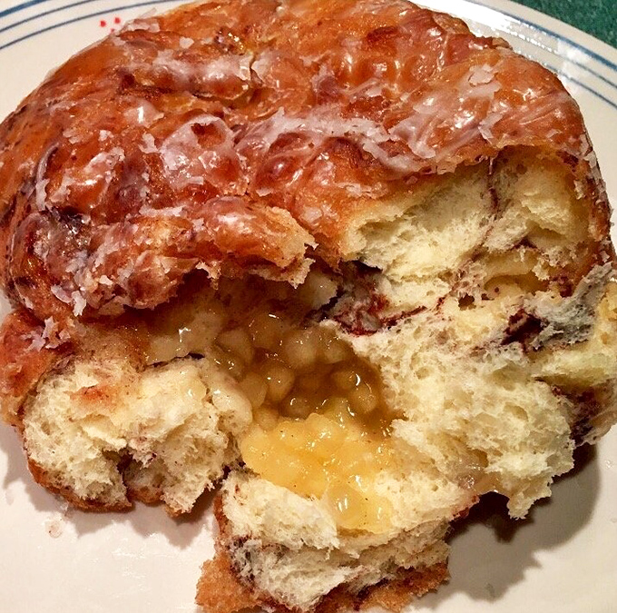 Cut into this apple fritter and witness the perfect marriage of crispy exterior and pillowy interior, with pockets of cinnamon-apple bliss throughout.
