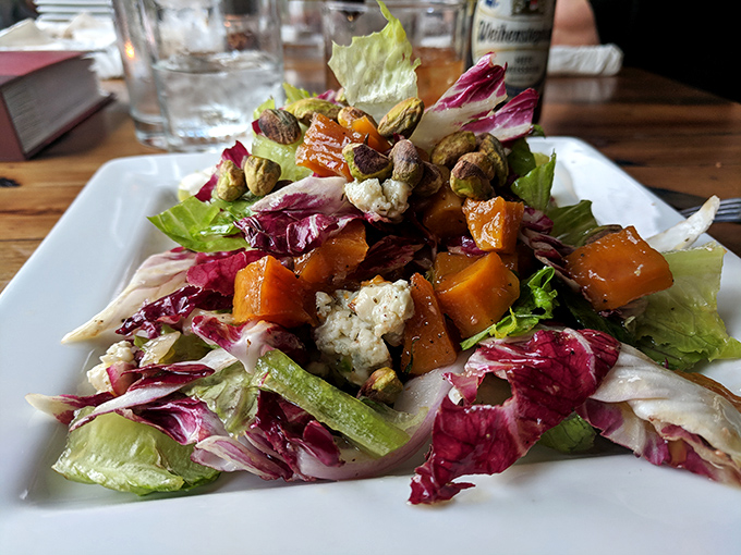 A salad this beautiful almost makes you forget you came for pizza. Almost.