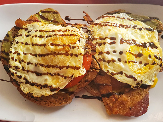 Eggs on toast? No, this is breakfast architecture&mdash;perfectly cooked eggs atop a foundation of goodness with that chocolate drizzle adding unexpected drama.