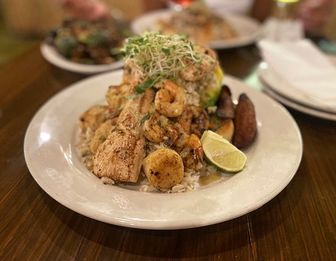 Seafood and rice that doesn't just speak to your stomach but writes it love poetry. The lime wedge isn't garnish&mdash;it's essential punctuation.