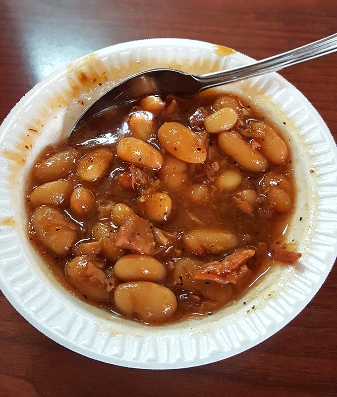 These aren't just barbecue beans&mdash;they're tiny flavor bombs swimming in a sauce that should be bottled and sold as liquid happiness.