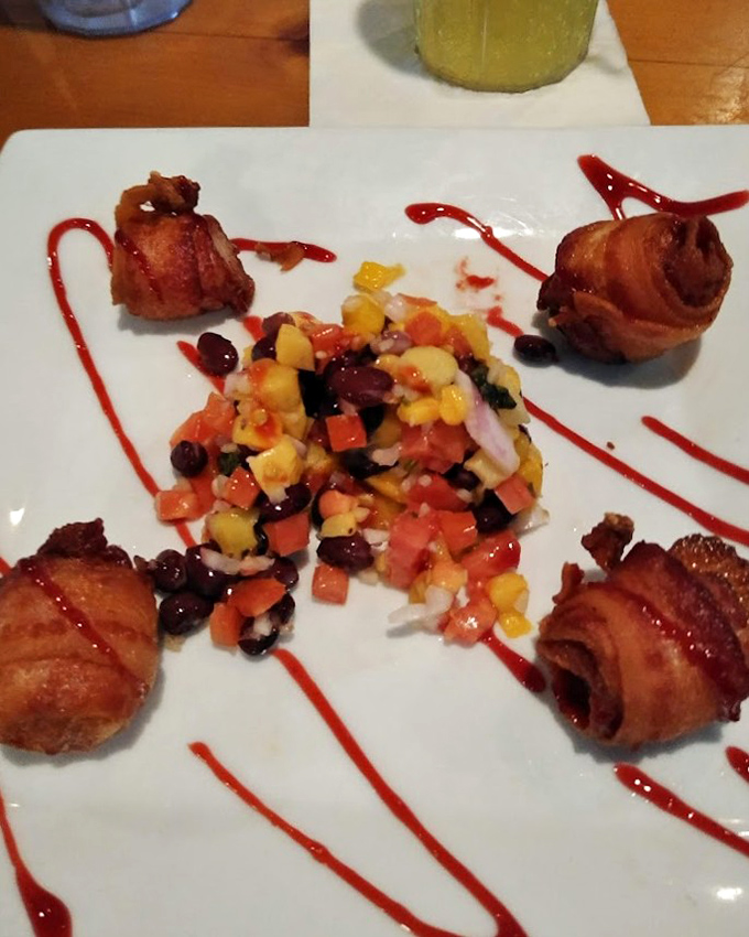 Bacon-wrapped scallops surrounded by colorful salsa - because some things are just meant to be together.