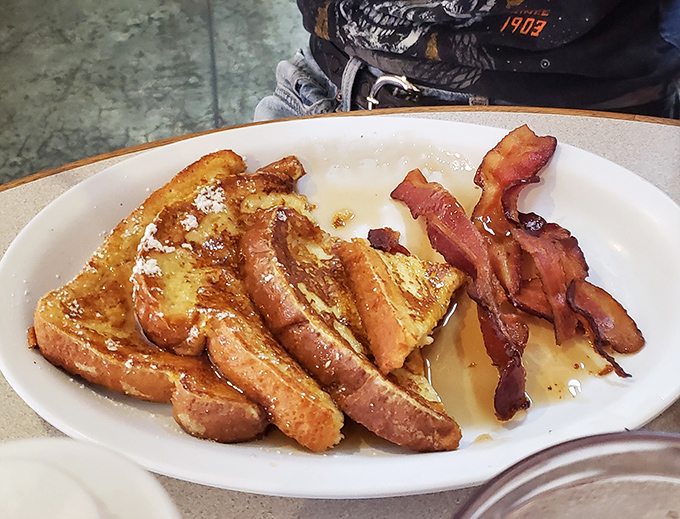 Golden French toast and perfectly crisp bacon—the breakfast equivalent of Springsteen and Clarence Clemons. A perfect duo.