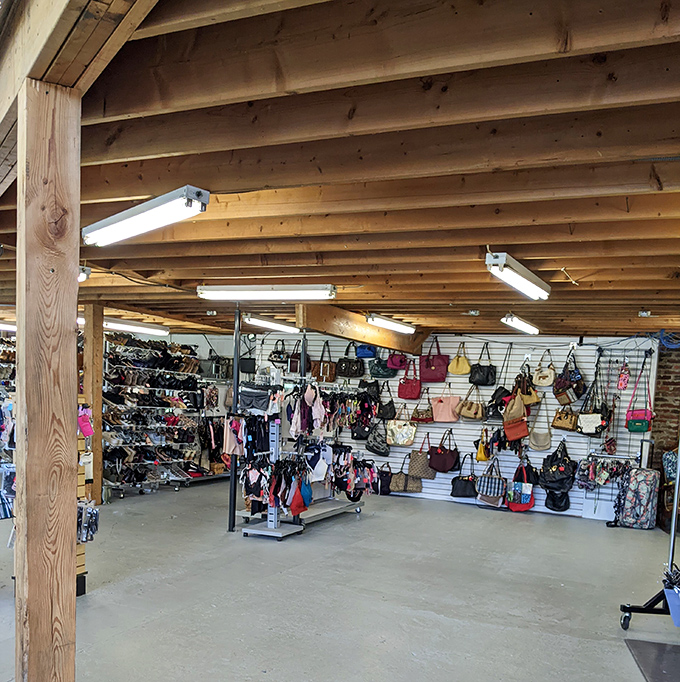 Handbags hanging like ornaments on the world's most practical Christmas tree, each one a potential new best friend.