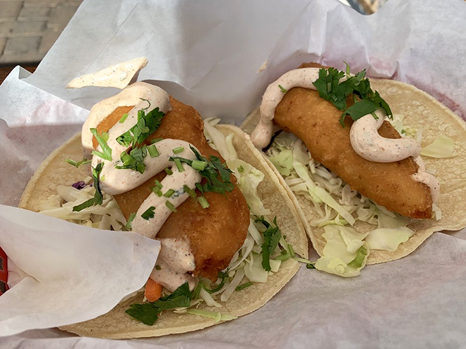 These fish tacos are dressed to impress, with fresh cilantro and cabbage adding crunch to every glorious bite.