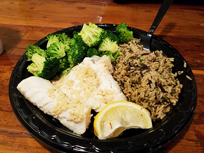 The baked cod arrives like an old friend you didn't know you missed&mdash;flaky, tender, and paired with rice and broccoli for a guilt-free seafood affair.