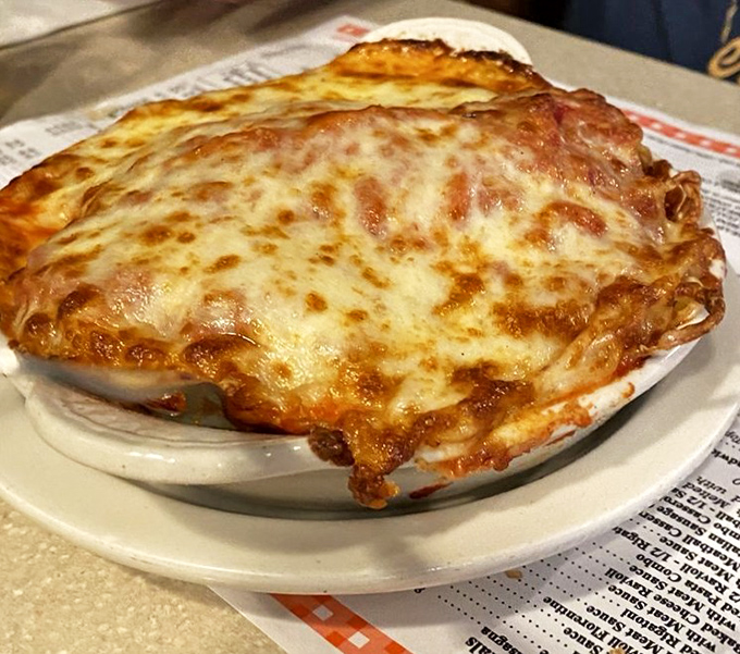 Behold the baked pasta masterpiece that's worth every carb-laden bite. This cheese blanket of happiness has comforted Ohioans through decades of winters.