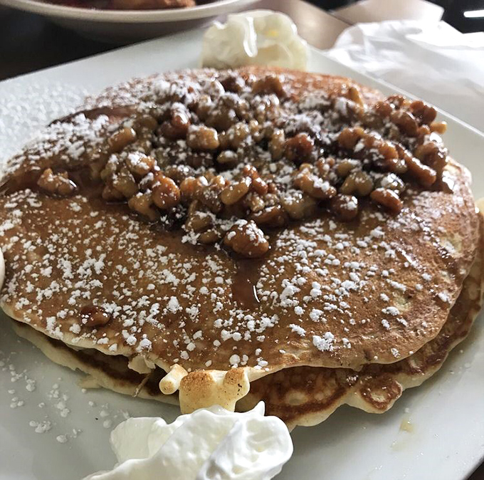 Walnut-topped pancakes dusted with powdered sugar&mdash;proof that sometimes the best accessories aren't in your closet but on your breakfast plate.