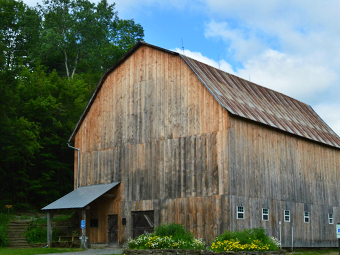 This weathered barn has seen more Pennsylvania seasons than most of us have seen Netflix series, standing proud as a testament to rural craftsmanship.