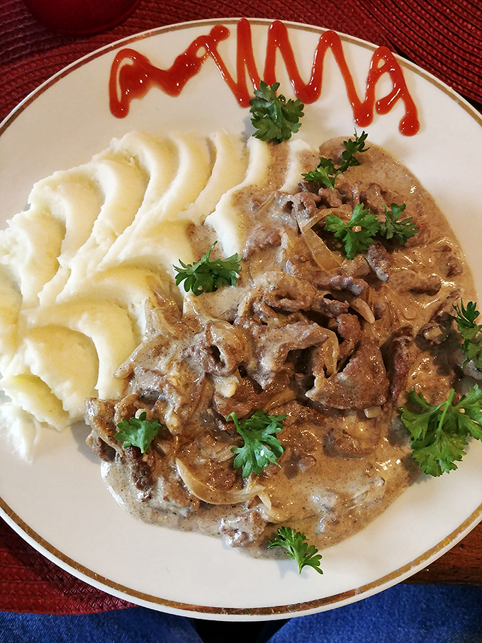 Beef stroganoff that makes you want to write poetry. Creamy, rich, and paired with mashed potatoes sculpted so perfectly they deserve their own art exhibition.