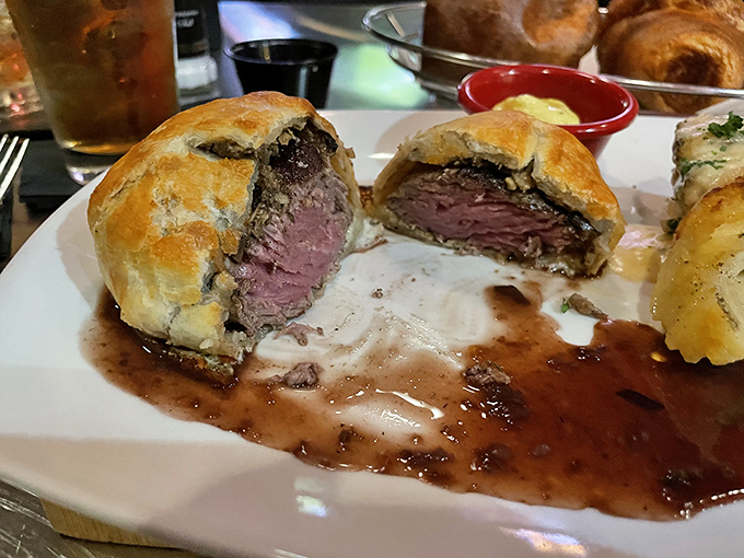 Beef Wellington wrapped in pastry like a delicious present you get to unwrap yourself.