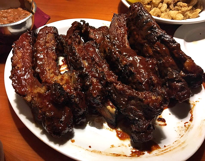 These ribs don't just fall off the bone&mdash;they practically leap onto your fork, glistening with a sauce worth licking off your fingers.