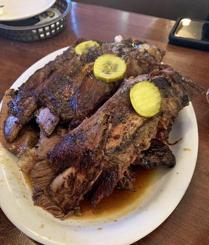 Beef ribs so substantial they could've been served to Fred Flintstone. That bark is the result of smoke whispering to meat for hours.