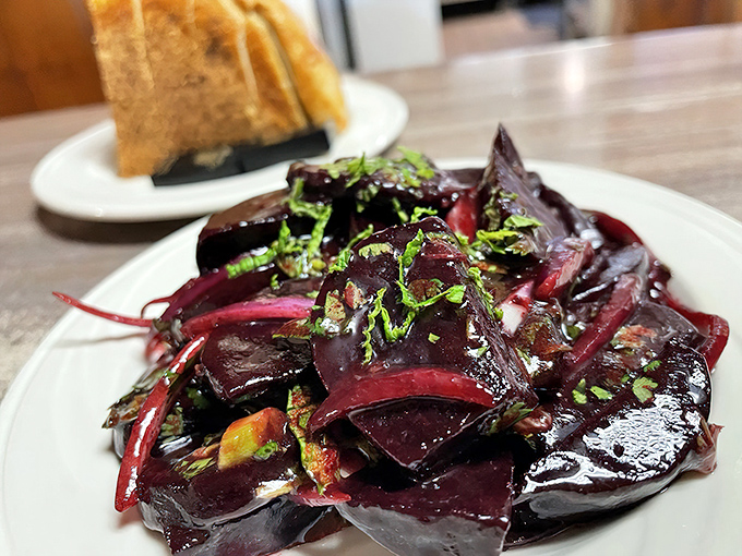 Beets transformed from "that thing grandma made you eat" into a sophisticated salad that makes you question all your previous vegetable prejudices.