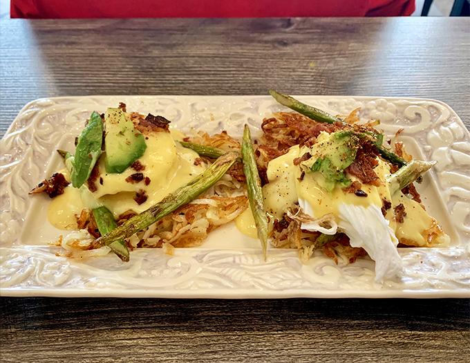 The legendary Bird's Nest&mdash;where hash browns, asparagus, and poached eggs unite under hollandaise in perfect harmony.