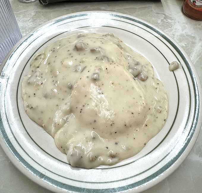 Biscuits and gravy so creamy and peppery, they could make a grown Hoosier weep with joy. Comfort food that hugs you from the inside.