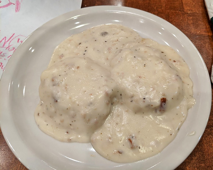 Biscuits and gravy so creamy they could make a Southern grandmother nod in approval while secretly asking for the recipe.