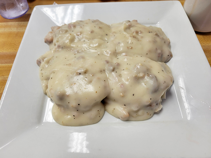 Biscuits and gravy: Southern comfort on a plate. This creamy, peppery blanket of goodness could make even a Monday morning bearable.
