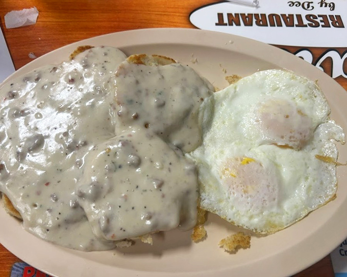 Biscuits drowning in sausage gravy - the kind of breakfast that requires a post-meal nap strategy.