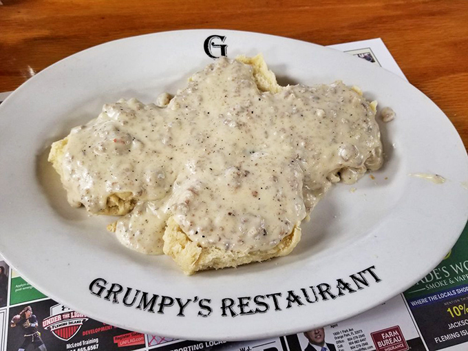 The legendary biscuits and gravy&mdash;where peppery, sausage-studded cream gravy blankets fluffy biscuits in a comfort food masterpiece that haunts dreams.