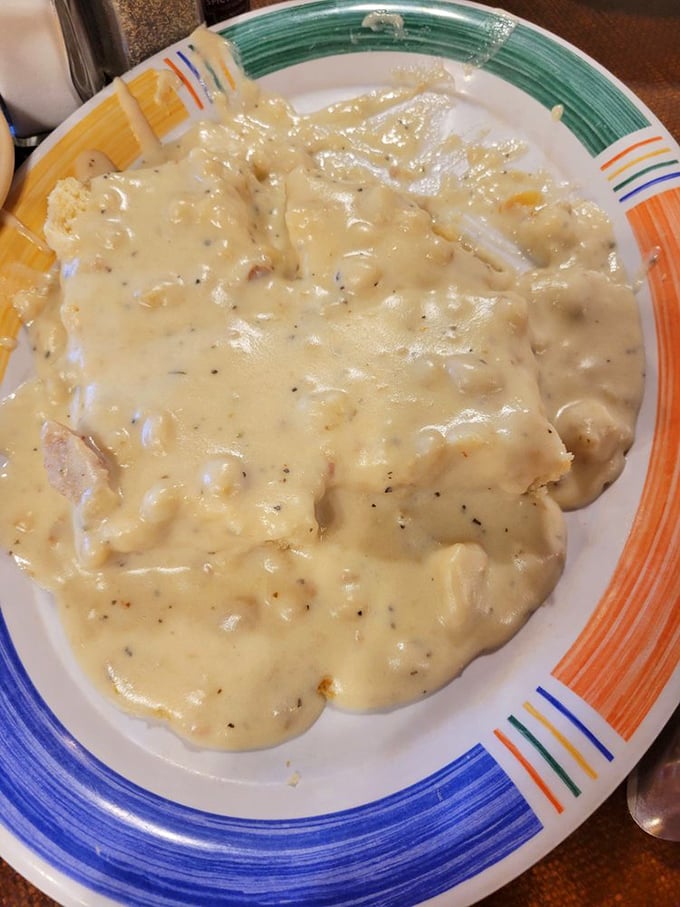 Biscuits and gravy that doesn't just speak Southern&mdash;it writes poetry with pepper flecks and sausage chunks in creamy harmony.