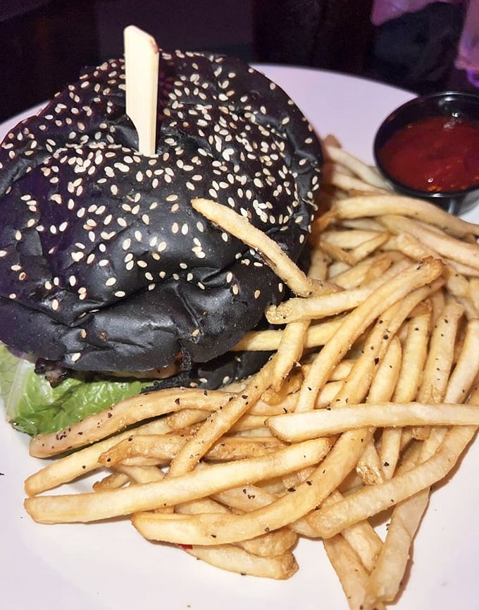 This isn't your average burger - it's a towering masterpiece that demands both hands.