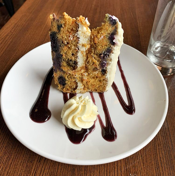 This isn't just cake&mdash;it's a sweet conspiracy between blueberries and cream cheese frosting that makes you forget you came for seafood.