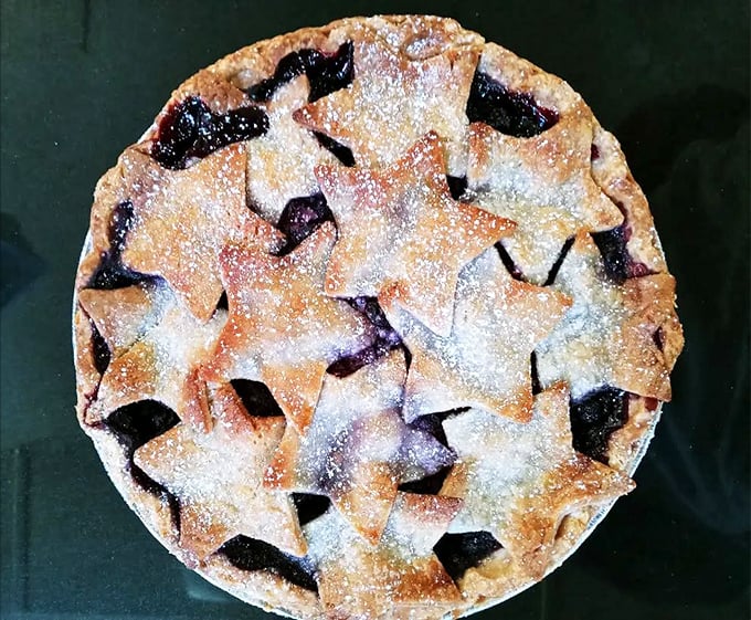 This blueberry masterpiece proves that sometimes the most beautiful art comes with a perfectly flaky crust.