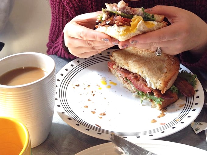 This isn't just a sandwich&mdash;it's architecture. Layers of fresh ingredients stacked between homemade bread create the skyscraper of breakfast sandwiches that's worth every delicious structural collapse.