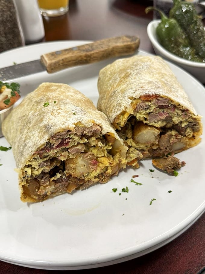 Breakfast burrito nirvana: Smoked meat and eggs wrapped in a tortilla blanket. It's like your morning routine got a serious upgrade.