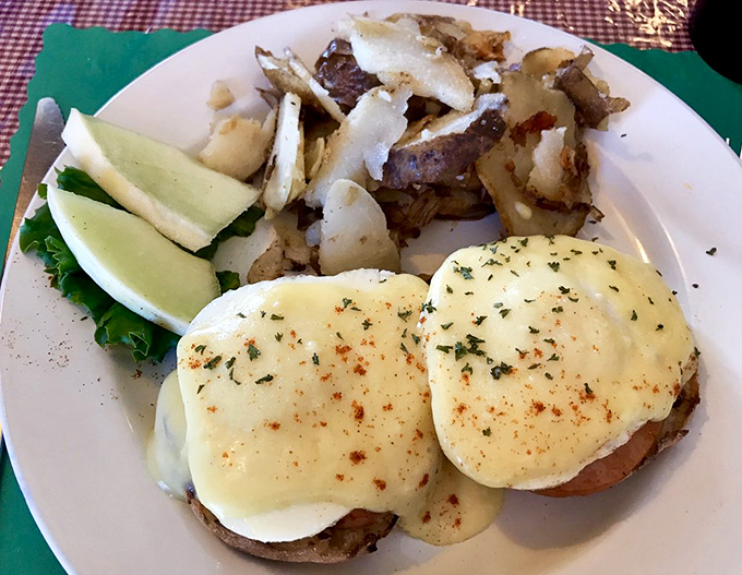 Eggs Benedict done right&mdash;perfectly poached eggs, creamy hollandaise, and home fries that make you question why anyone bothers with fancy brunch spots.