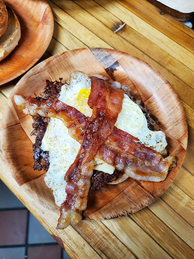 Breakfast meets burger in this glorious creation. The crispy bacon and sunny-side-up egg transform an already great burger into morning magnificence.