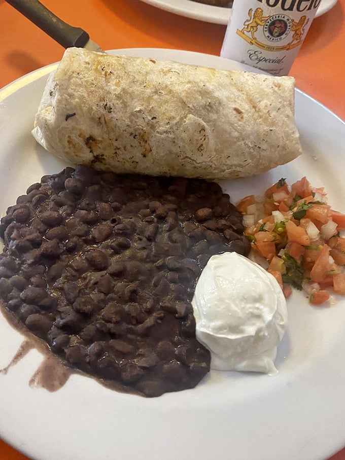 This burrito means business&mdash;a flour tortilla fortress protecting black beans, fresh pico, and sour cream from your imminent hunger attack.