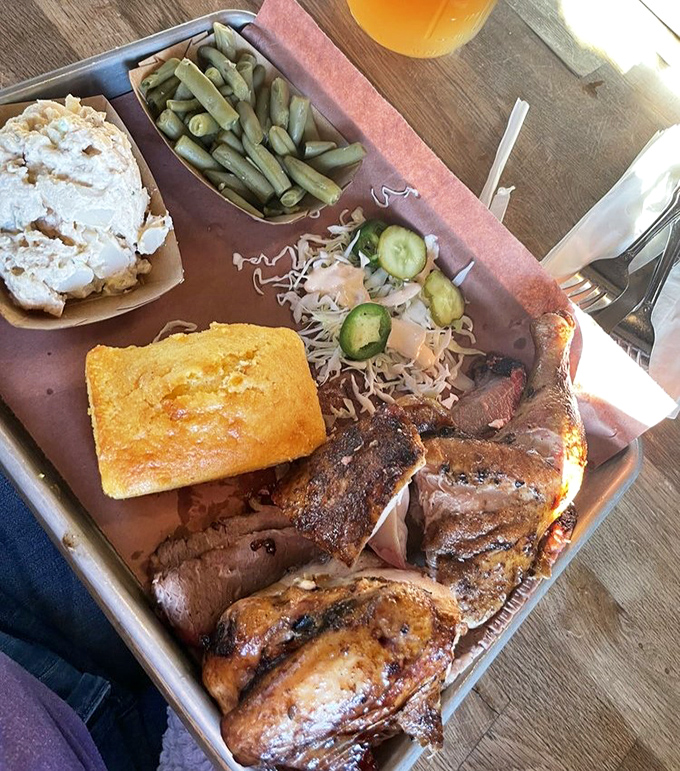 Brisket and chicken sharing a plate like old friends, with coleslaw playing peacekeeper. This is the diplomatic summit your taste buds have been waiting for.