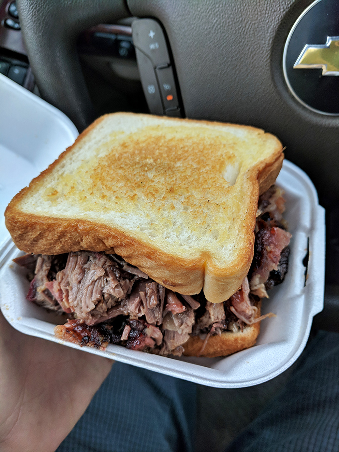 The car becomes an impromptu dining room when barbecue this good can't wait for proper seating. Dashboard dining at its finest.