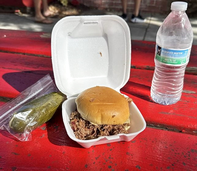 A humble sandwich that delivers an extraordinary experience. The pickle's not just a garnish&mdash;it's the perfect acidic counterpoint to smoky richness.