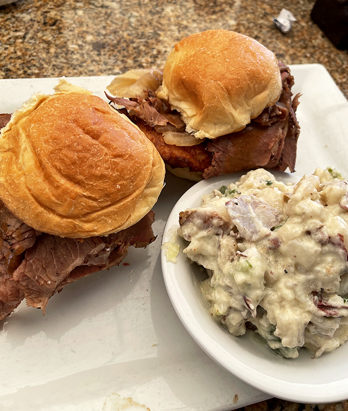 These brisket sliders aren't messing around. Tender meat piled high on pillowy rolls with potato salad that would make your grandmother jealous.