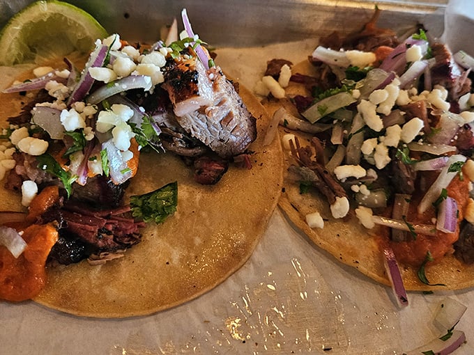 These brisket tacos aren't just food&mdash;they're an experience. Tender meat, bright toppings, and tortillas that deserve their own fan club.