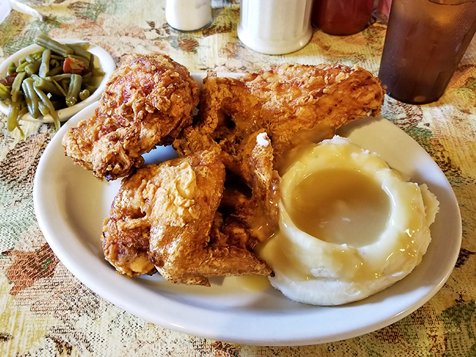 Fried chicken so perfectly golden, it makes you wonder if the cook has a PhD in crispology. Those green beans aren't just a side&mdash;they're absolution.