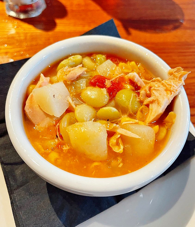 Brunswick stew that could make your grandmother jealous. Tender chunks of meat swimming with lima beans and potatoes in a tomato-tinged broth.