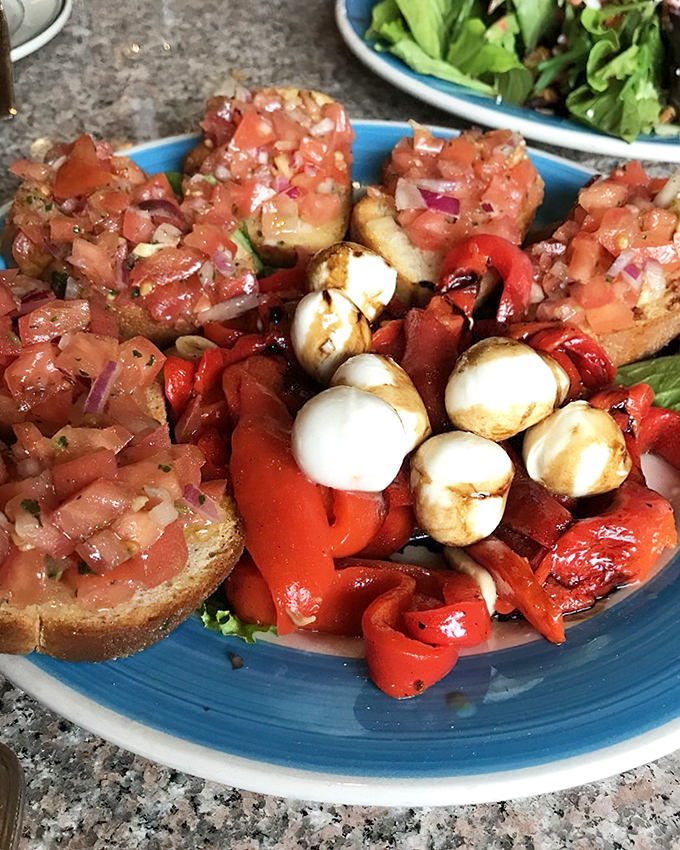 Bruschetta and mozzarella that could make a grown person weep. The tomatoes look like they were harvested from Eden's personal garden.