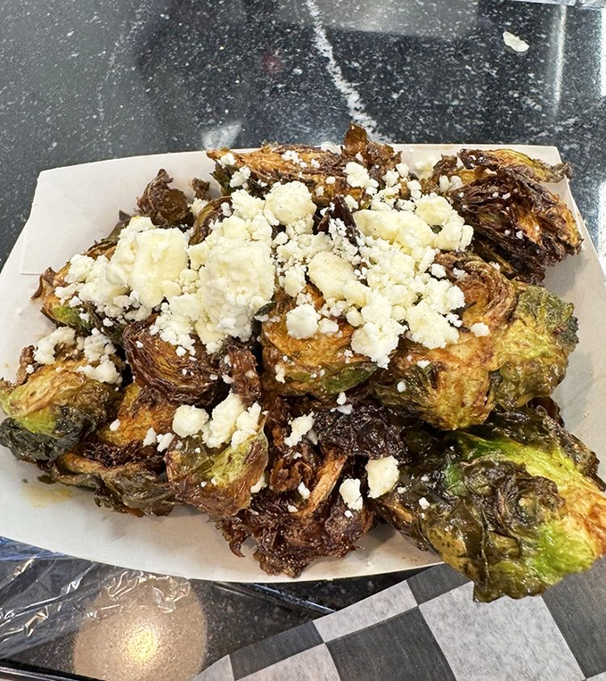 Brussels sprouts that could convert even the most dedicated vegetable skeptics, crowned with cheese that makes everything better.