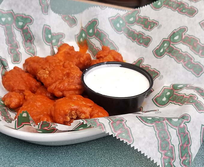 Buffalo wings so vibrant they practically glow, accompanied by cooling ranch&mdash;the yin and yang of appetizer perfection.