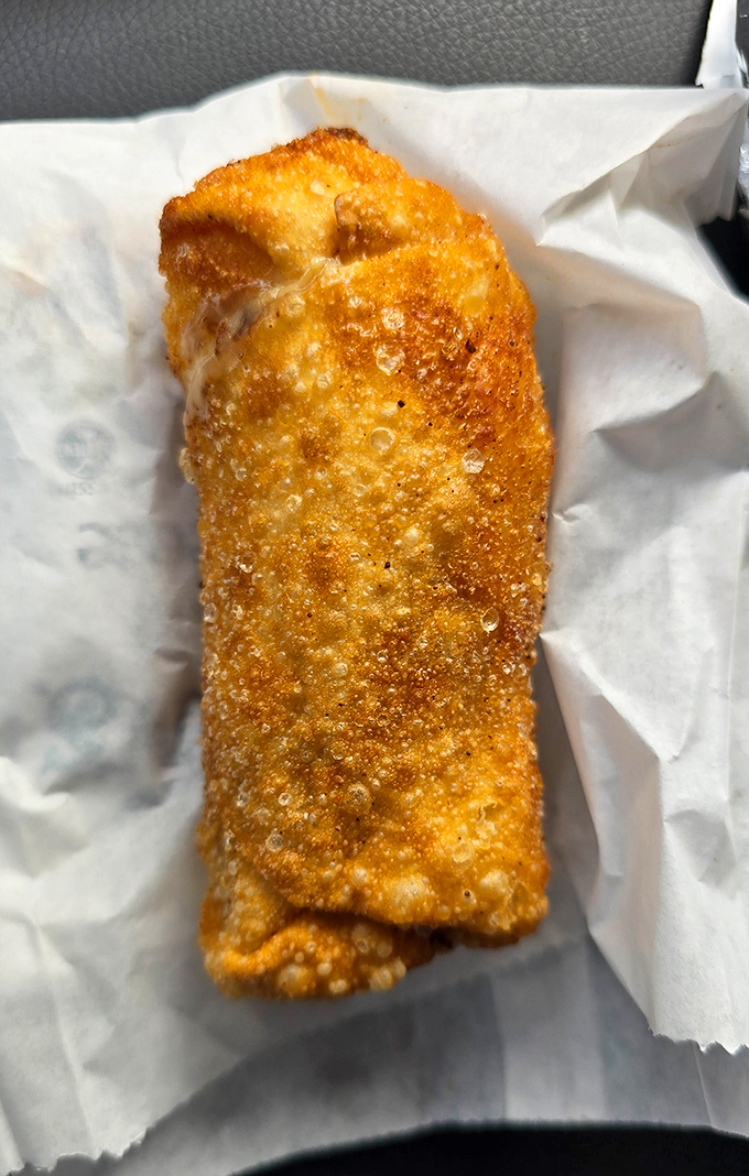 Plot twist! This golden-fried buffalo chicken egg roll proves Cheesesteak & Co. isn't just a one-hit wonder in the flavor department.