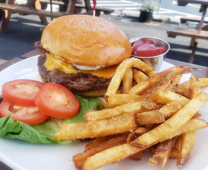 The burger arrives like a champion entering the ring&mdash;juicy, perfectly charred, and ready to knock your taste buds into next week.