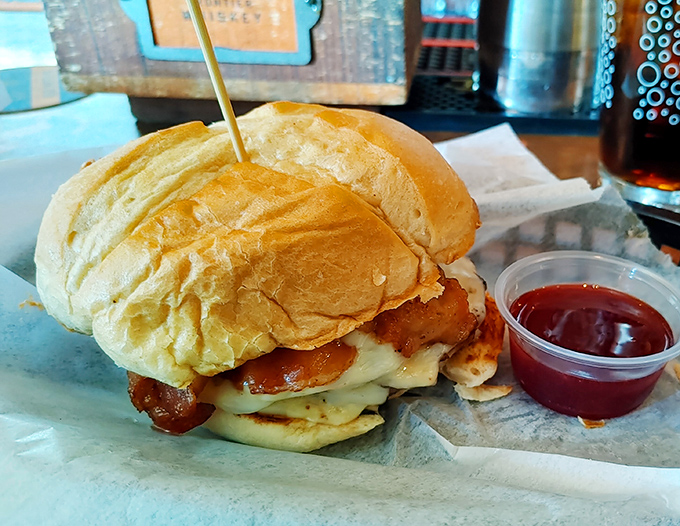 This isn't just a burger; it's an architectural marvel of flavor that somehow stays together long enough.