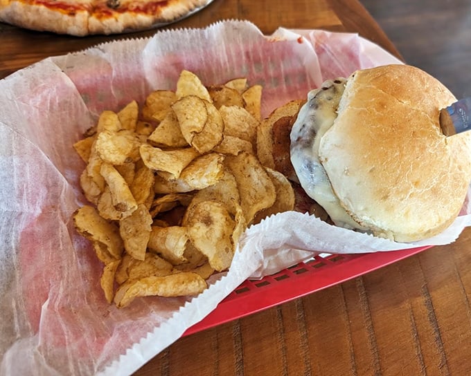 A burger that demands two hands and zero distractions. Those house-made chips aren't sidekicks&mdash;they're co-stars in this delicious production. 
