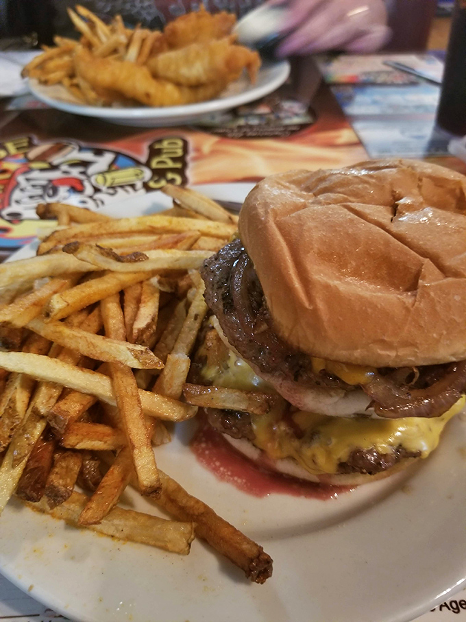 This isn't just a burger&mdash;it's an architectural masterpiece of beef, cheese, and toppings that requires both hands and several napkins.