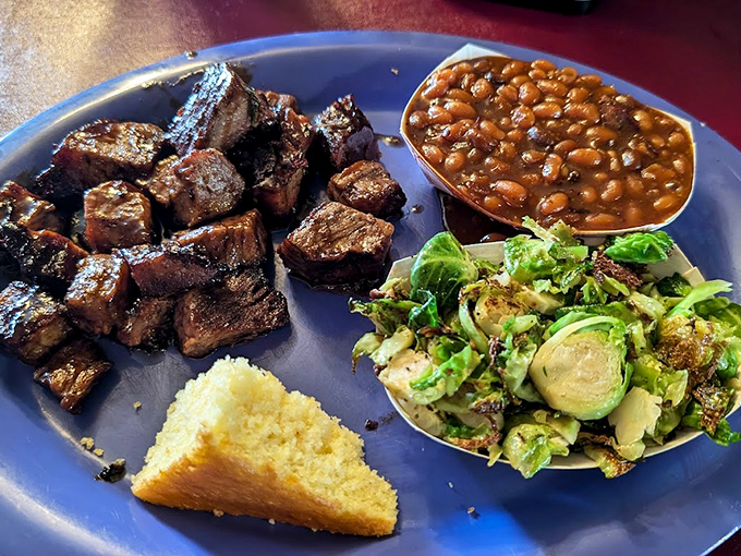 Burnt ends—the barbecue world's equivalent of hitting the culinary lottery. These caramelized cubes of brisket heaven come with sides that don't merely accompany, they complement.